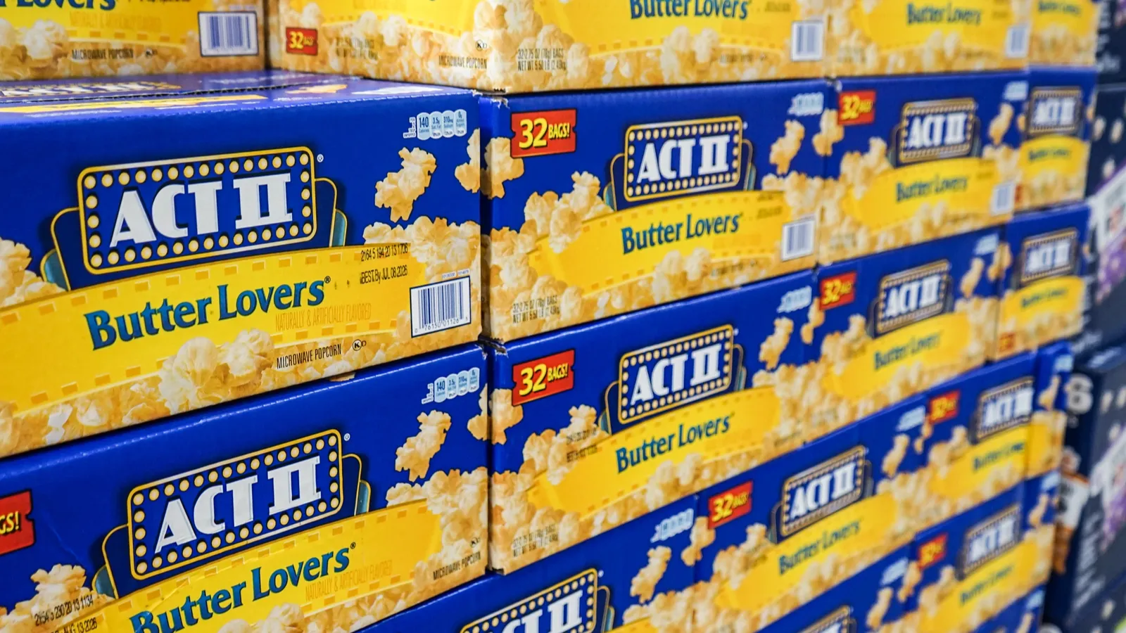 Guy Fieri’s new popcorn lineup goes full flavor overload, and one bag ...