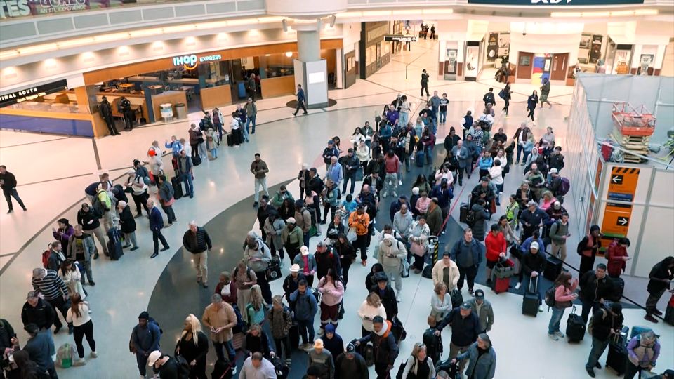 Overhead view shows massive line at one of the busiest airports in the ...
