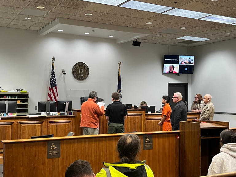 Semi driver who police say killed tow truck tech appears in court