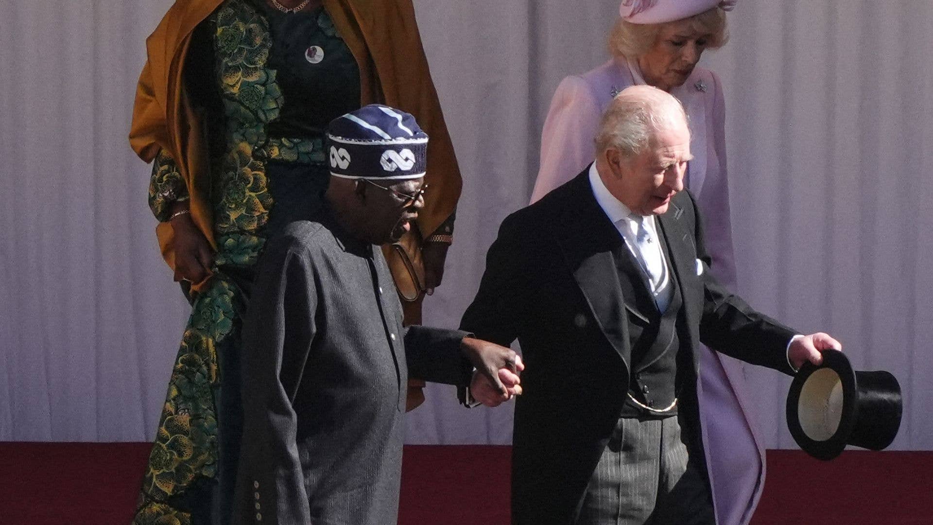 King Charles shares rare and 'unusual' hand-holding moment with Nigeria ...