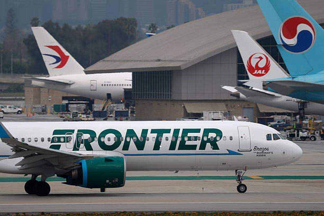 Flight diverted to Miami: man allegedly tries to open exit door ...
