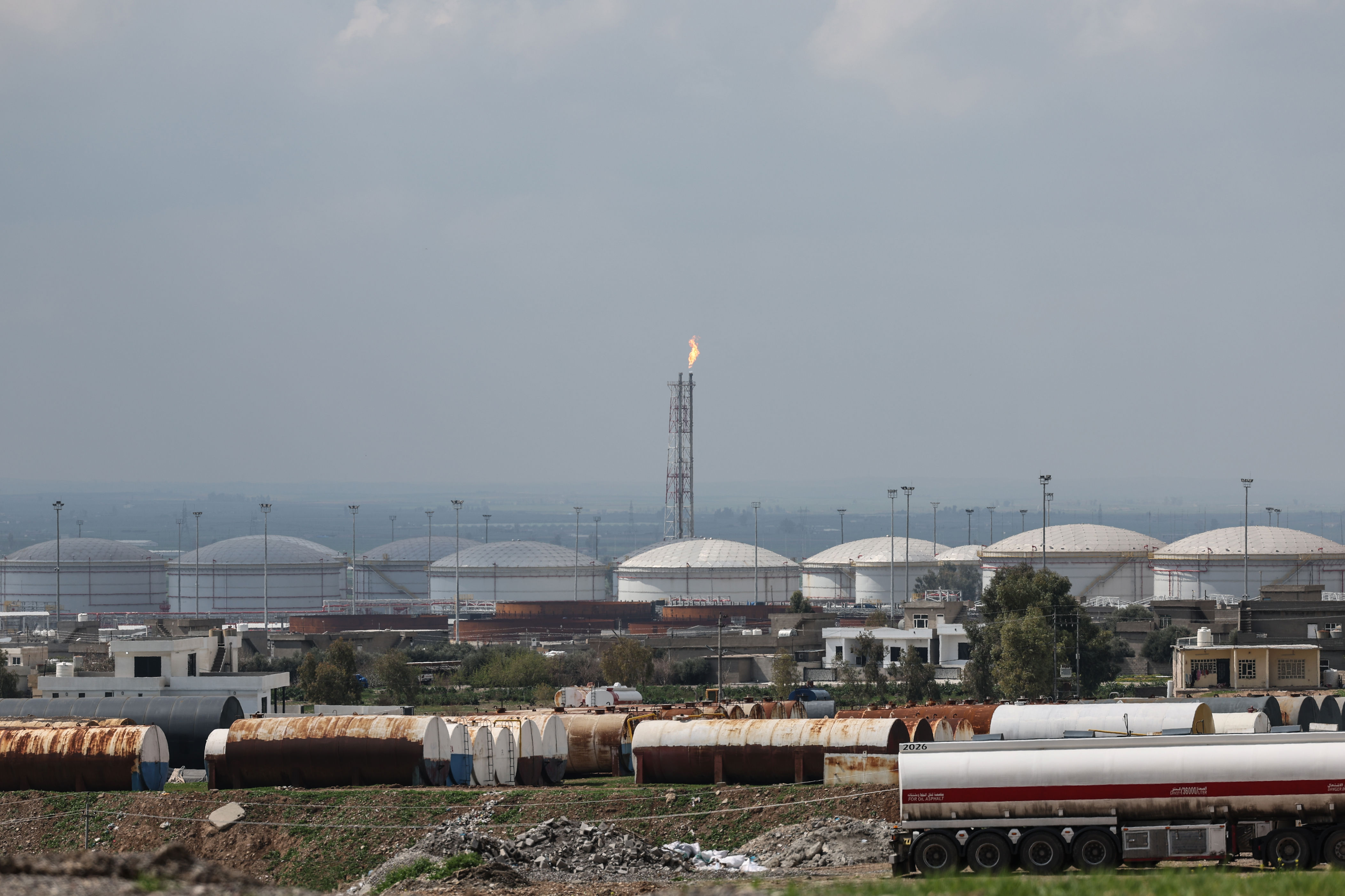 Oil prices climb again after strikes in crucial Iranian gas field