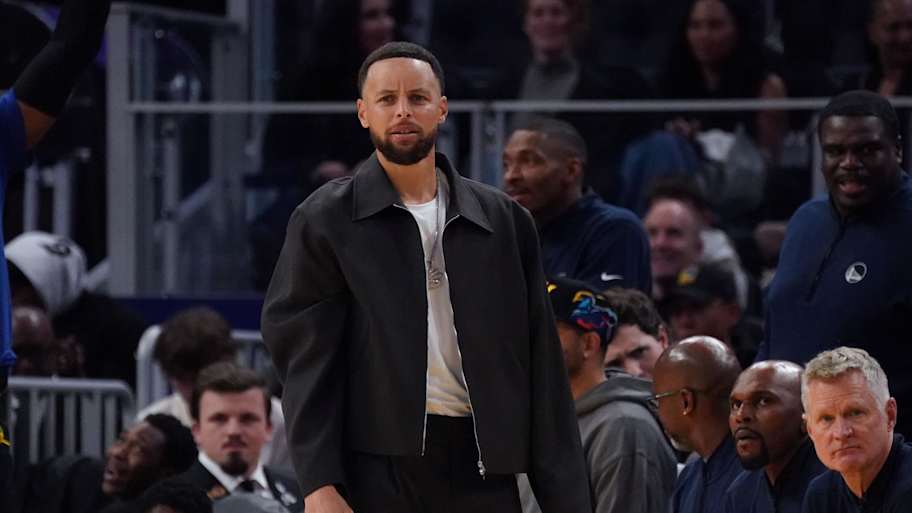 Fan ejected from Warriors-Celtics after pulling Steph Curry's arm in tunnel