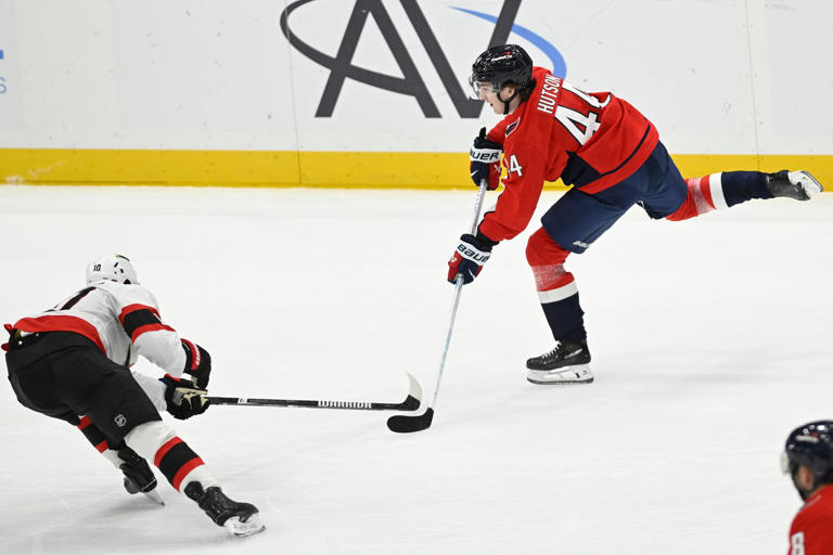 Defenseman Cole Hutson impresses in his NHL debut, then scores at the ...