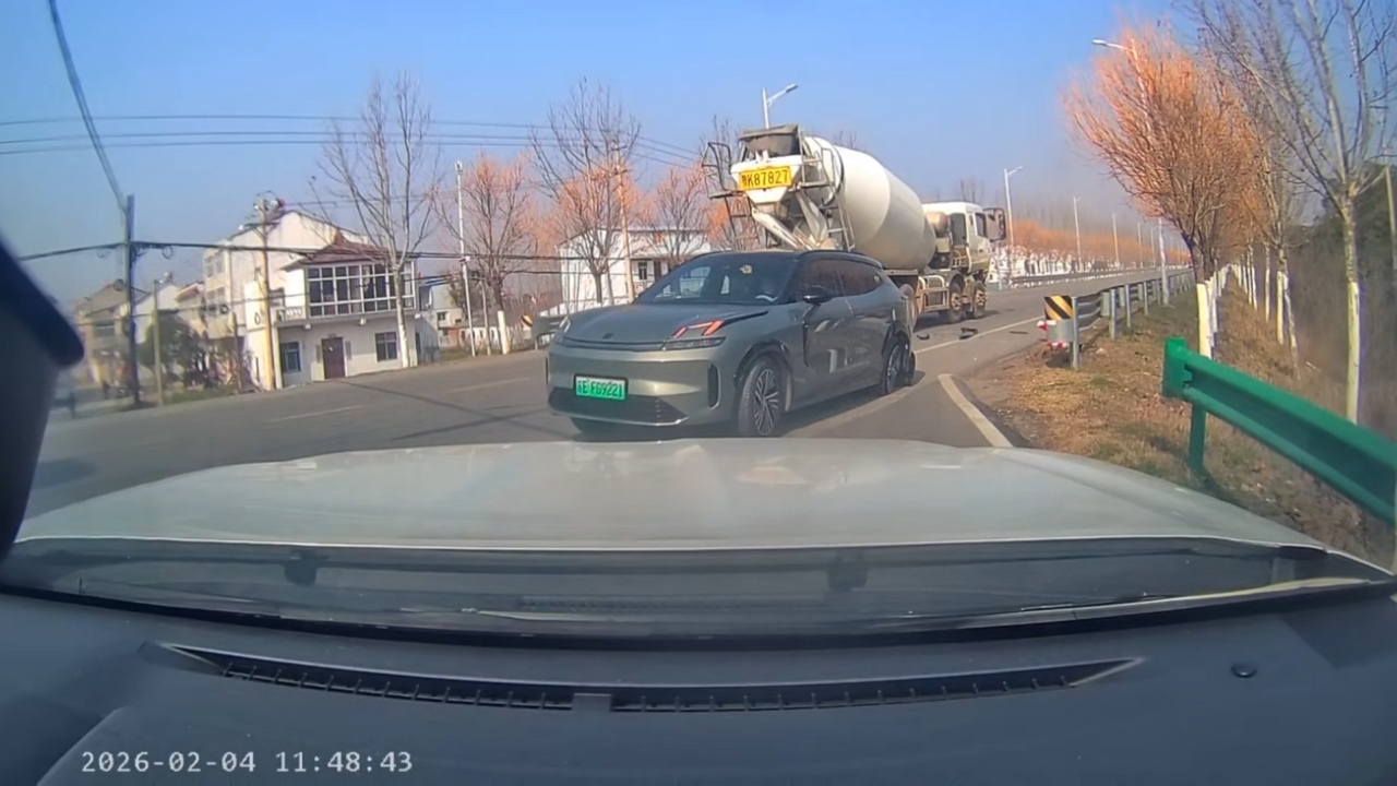 Car struck by mixer truck while attempting to pass through a crossroad ...