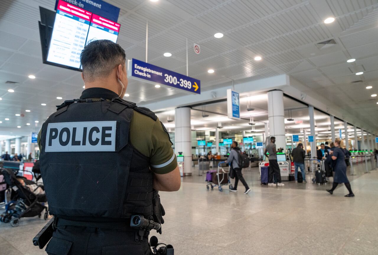 2 men arrested at Montreal airport after incident on flight prompts ...