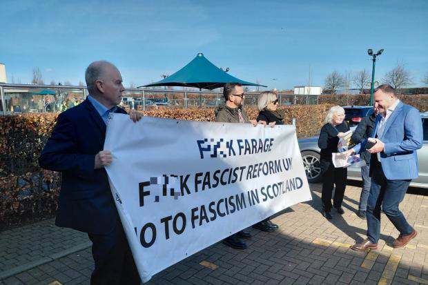 Protesters try to disrupt Reform UK conference ahead of Nigel Farage speech