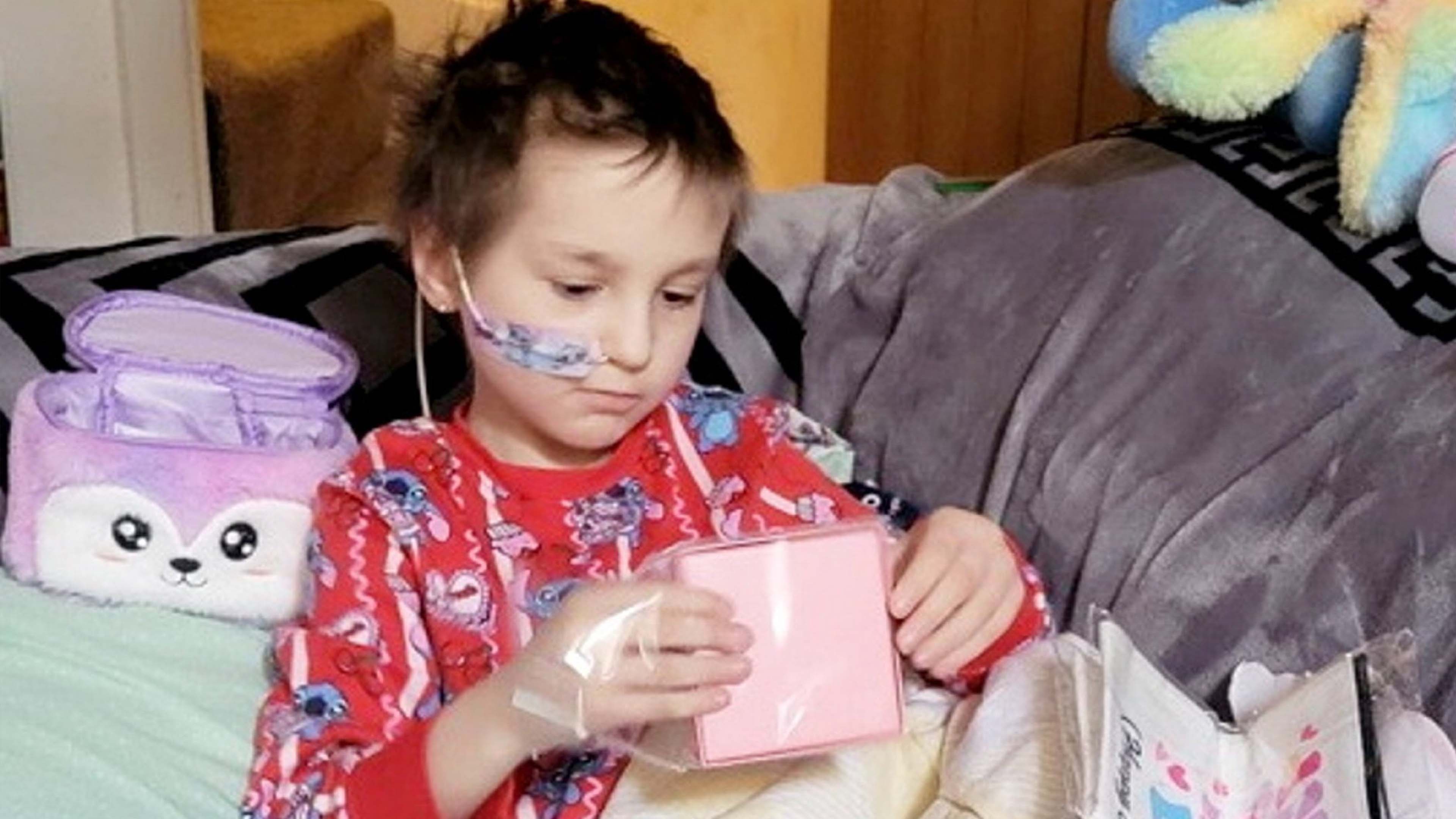 Brave cancer girl who set 300,000 birthday card record dies aged 8