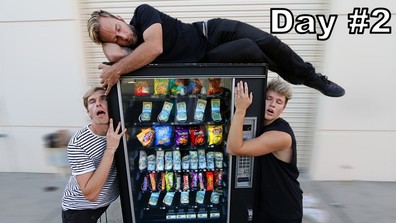 Competitors battle to outlast each other inside a vending machine for a ...