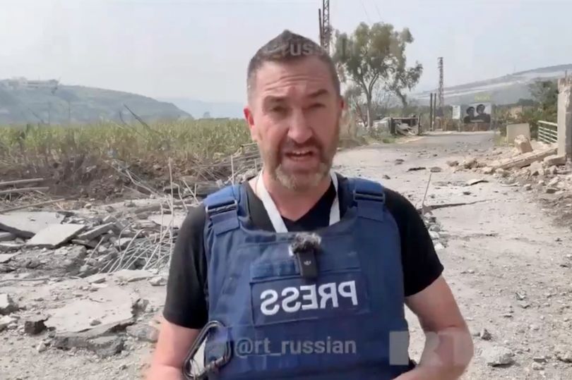 British journalist Steve Sweeney ducking 'Israeli missile strike ...