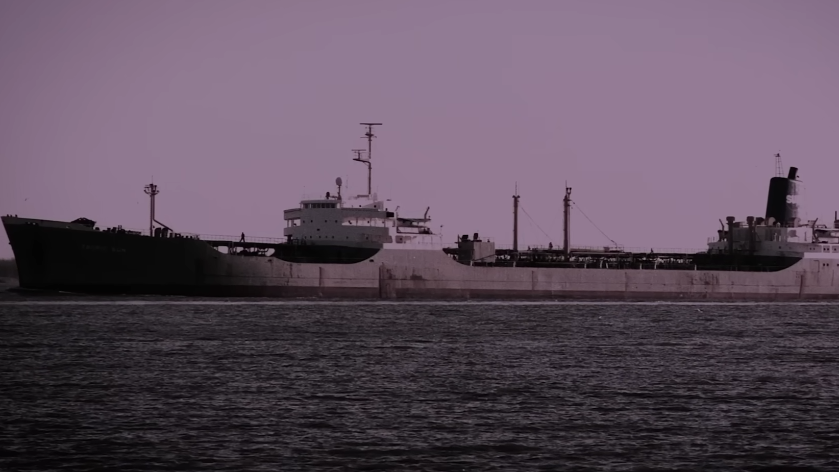 A cargo ship with 34 crew capsized before dawn