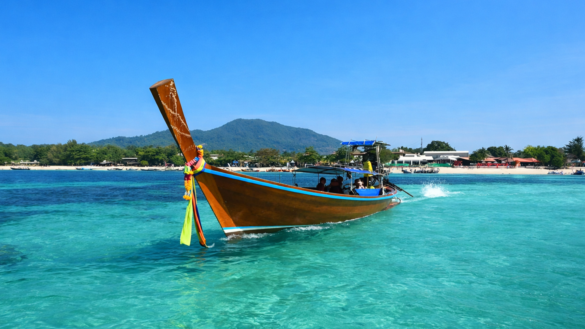 Thailand’s long-tail boat in stunning clear sea