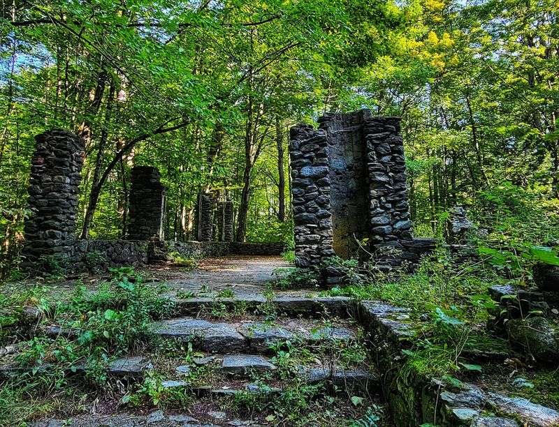 This forgotten New Hampshire castle ruins hike has a reputation that ...