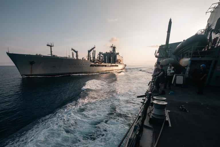 A US Navy oiler ran hard aground after its captain urged a last-minute ...