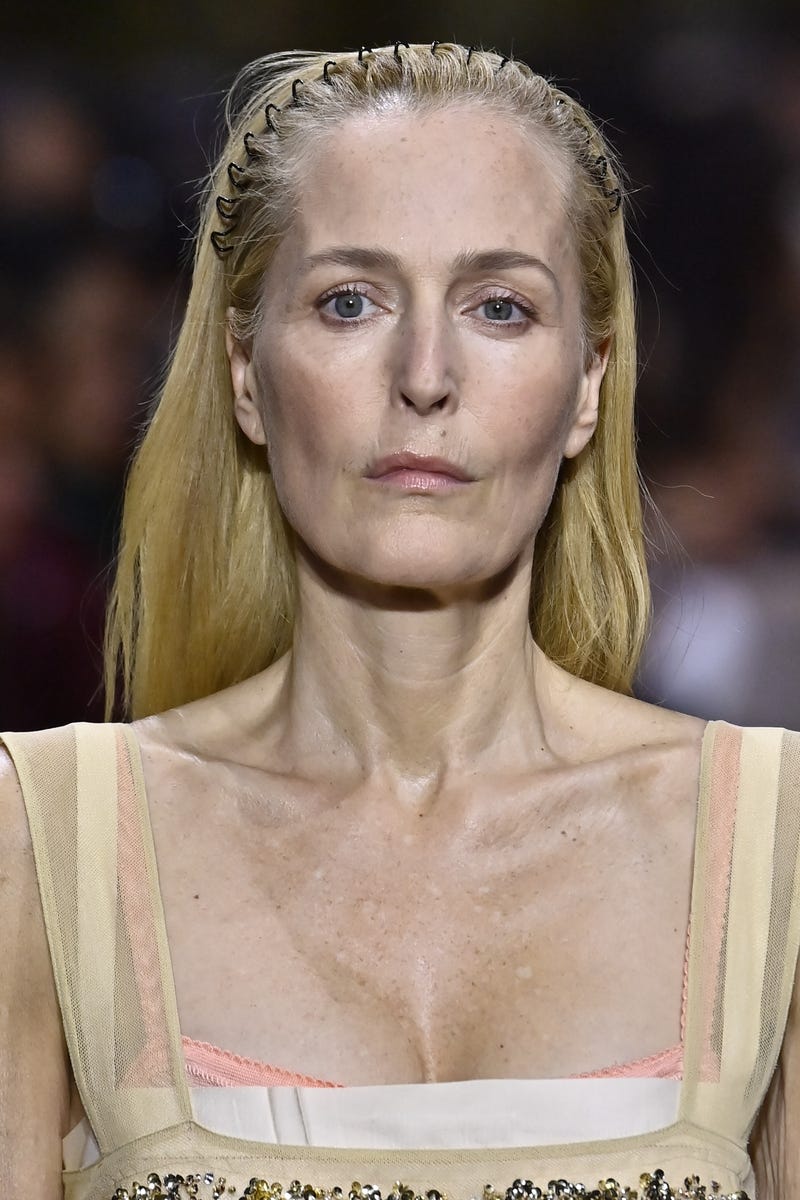Gillian Anderson wows on the catwalk in embellished mini dress at Paris ...