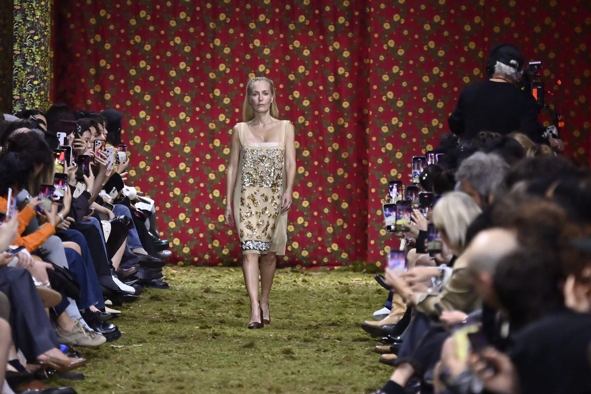 Gillian Anderson wows on the catwalk in embellished mini dress at Paris ...