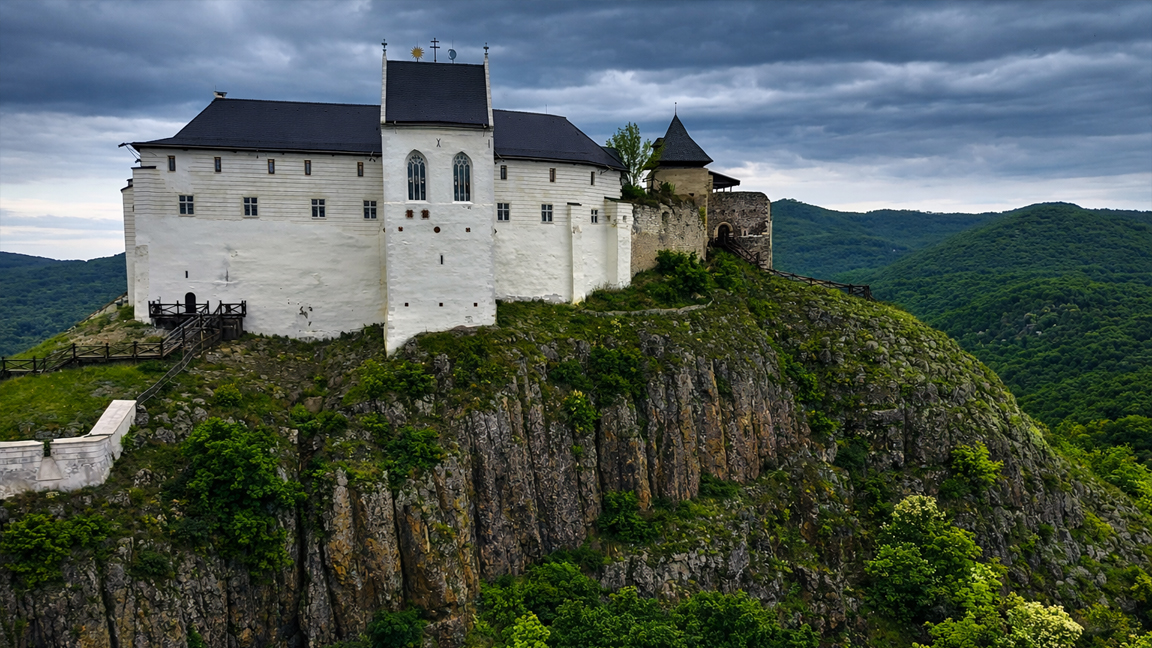 A mysterious castle built on the edge of a cliff