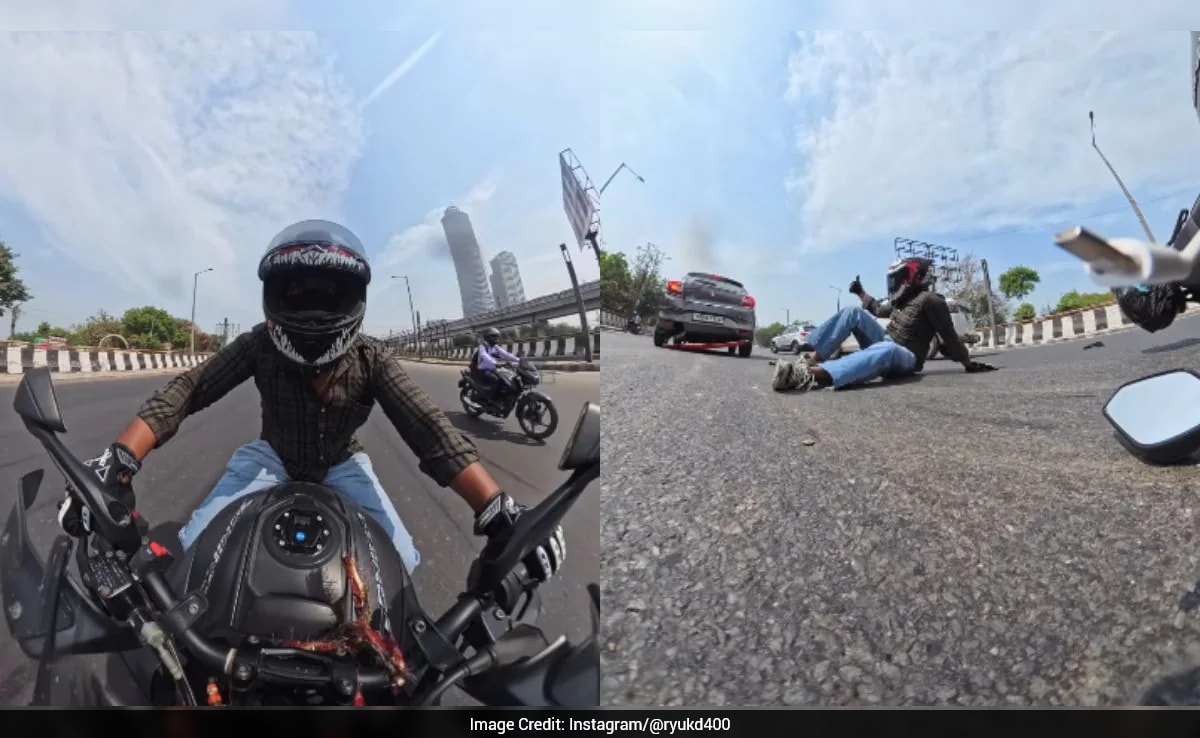 Biker gets into accident, stands up unscathed, gives thumbs-up to car ...