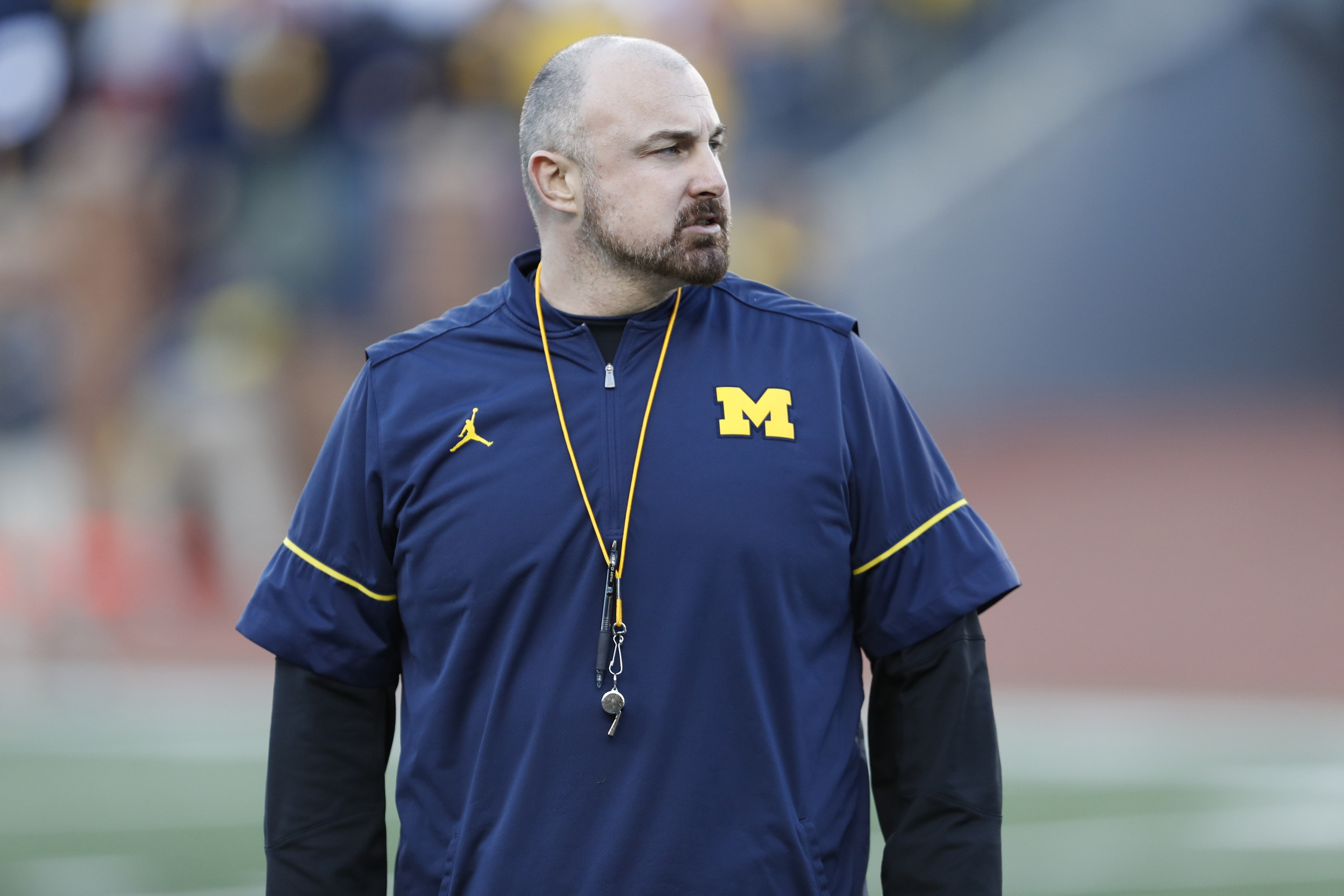 Former Michigan assistant Chris Partridge sues school over firing: 'The ...