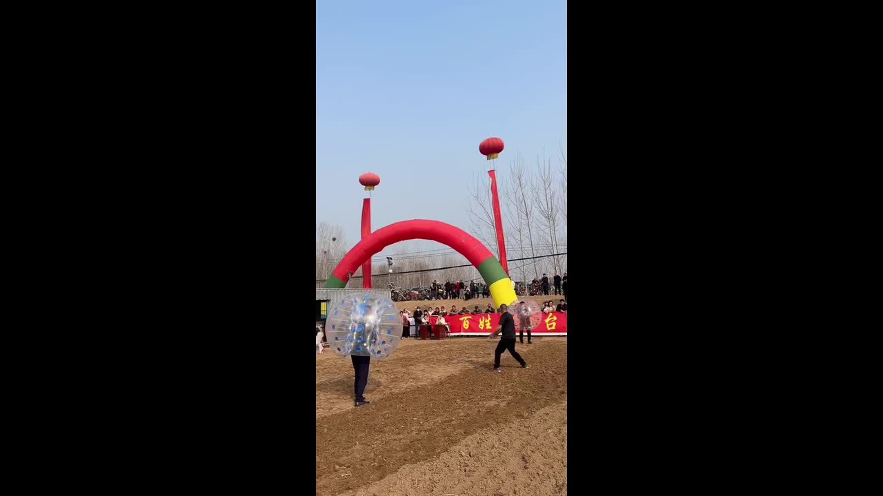 Bubble football mishap as referee gets knocked down in Shandong, China