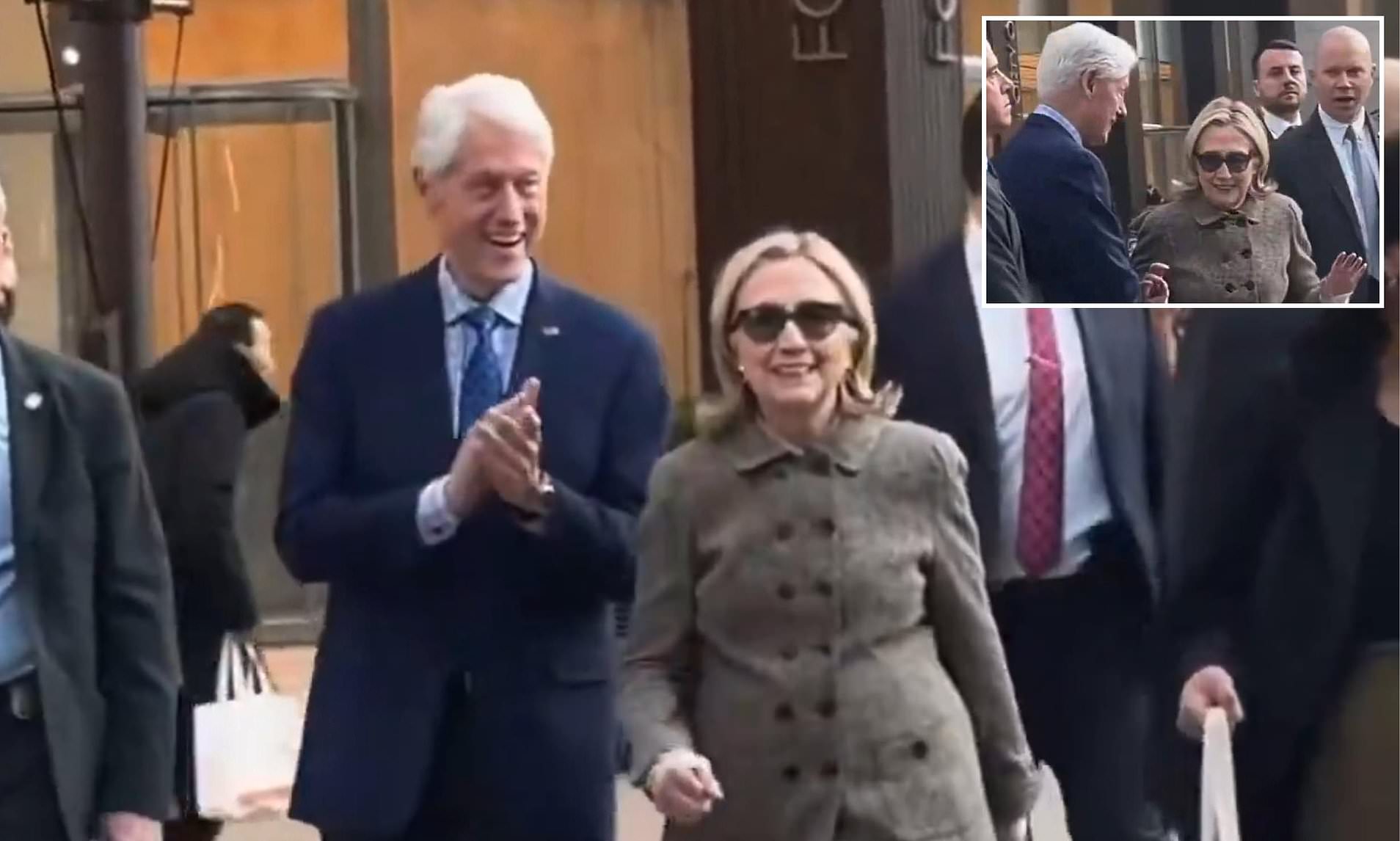 Awkward moment Hillary Clinton scolds husband Bill when he nudges her ...