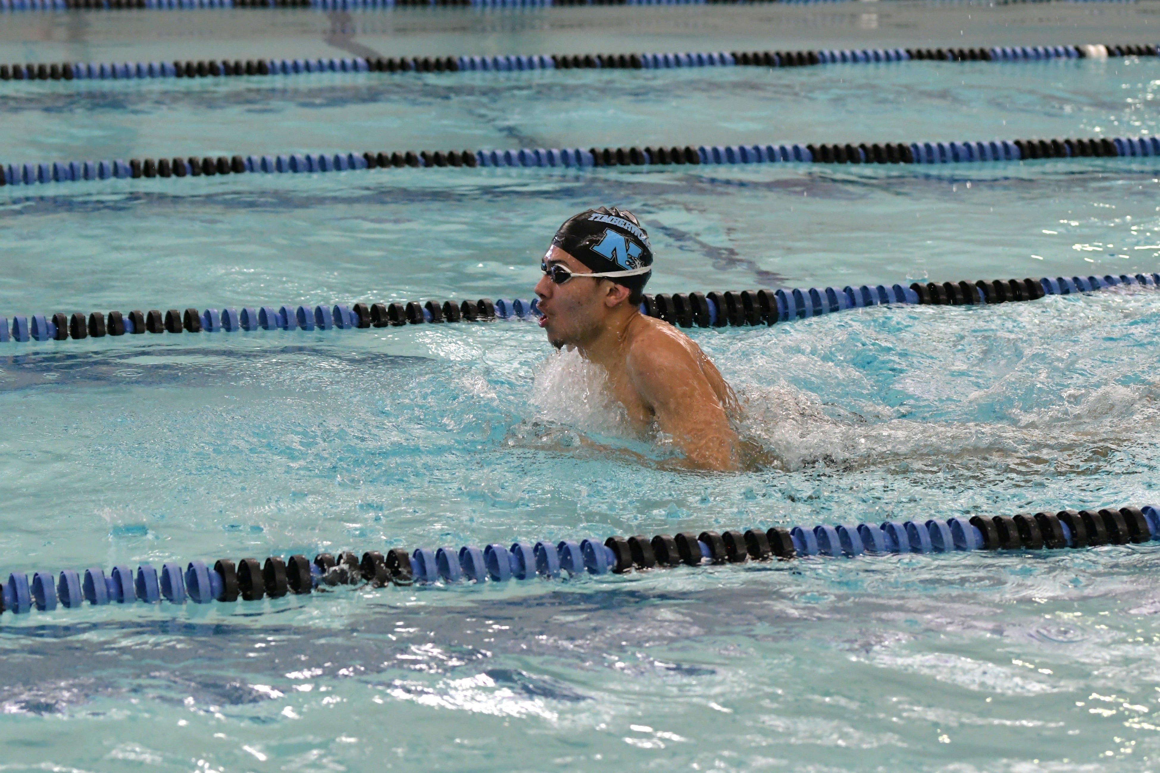 ES North's Logan Cruz takes record-breaking season to state swim meet