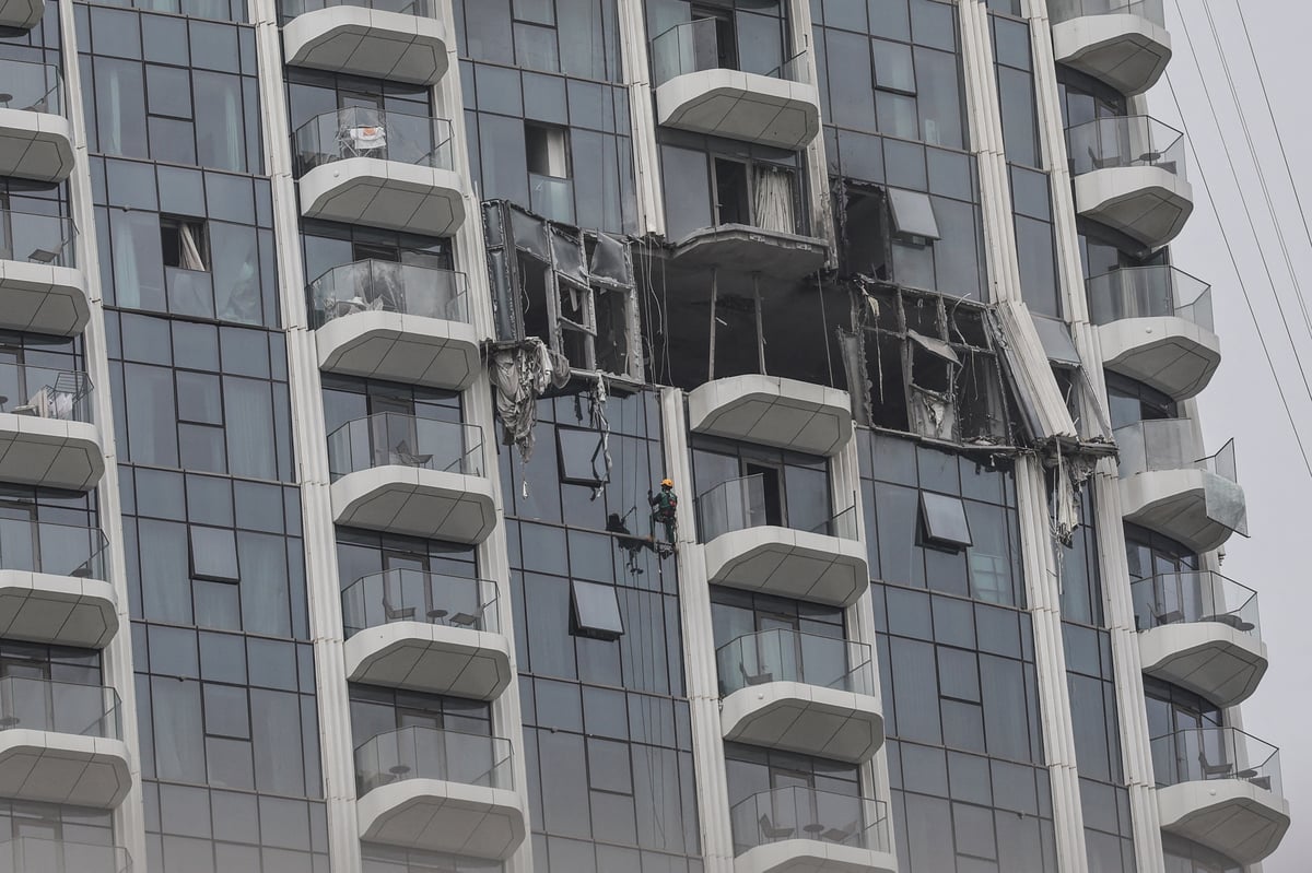 Video shows Dubai apartment block hit by drone as Iran war rages