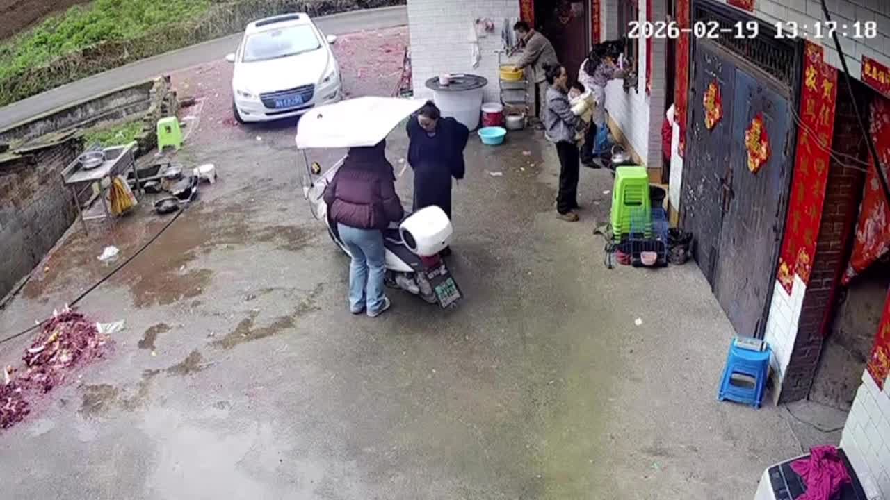 Woman crashes motorcycle into canal in Zhejiang, China