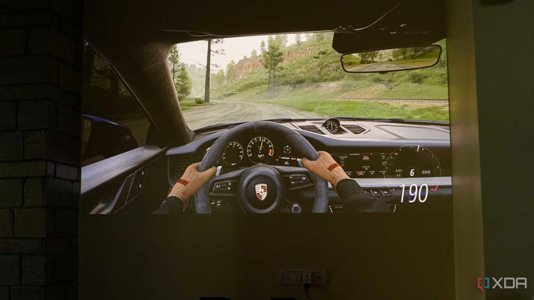 This projector gives me a 120-inch 4K screen for gaming that's cheaper ...