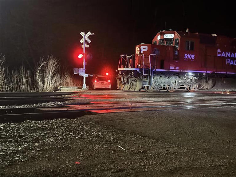 Van hit by train in Davenport