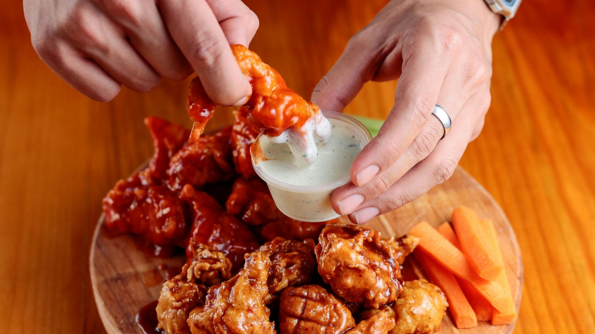 10 heat levels for wings & 10 dipping sauces that match