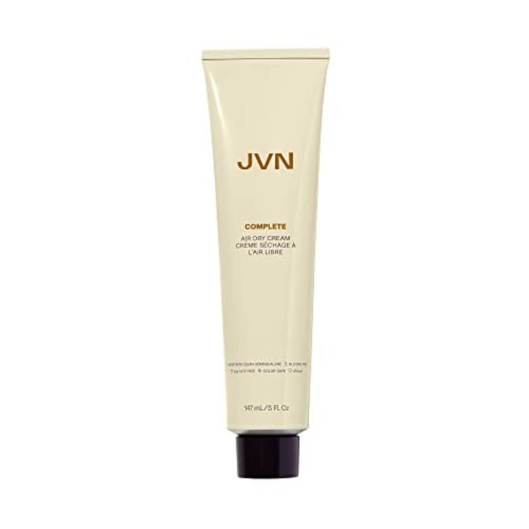 We asked experts how to tame frizzy hair — here are the products they love