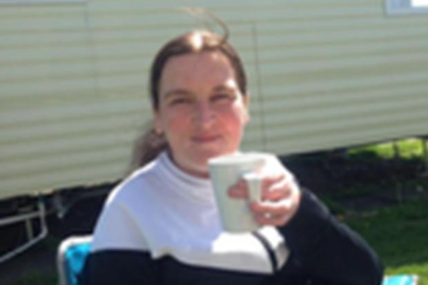 Woman dies at block of flats in Glasgow as murder investigation launched