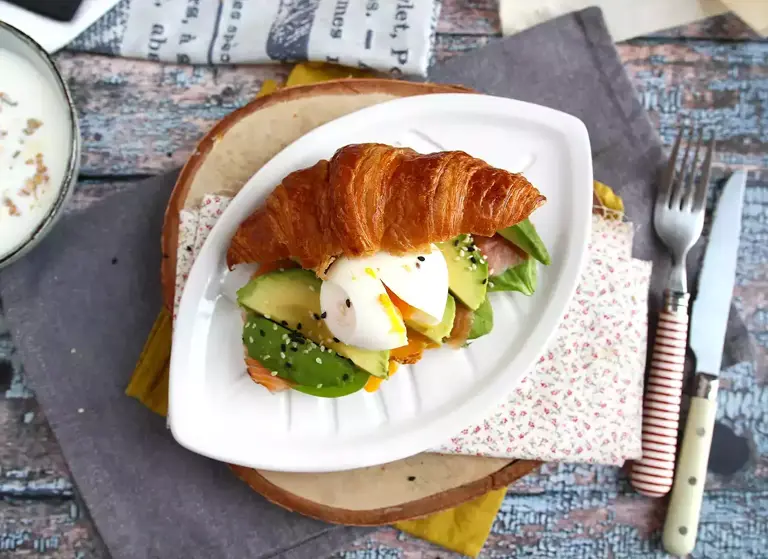 Brunch-style croissant sandwich