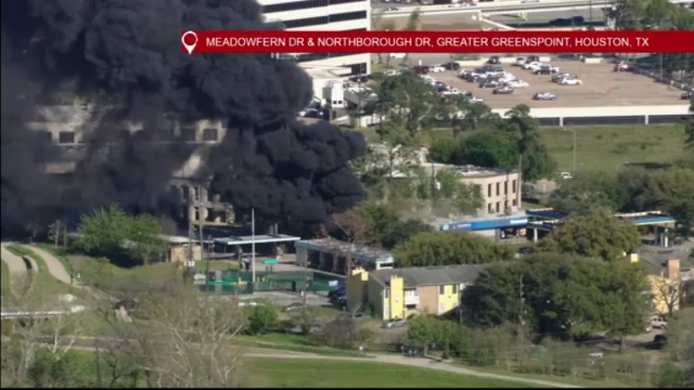 Large building fire in Greenspoint area caused by tires behind business ...