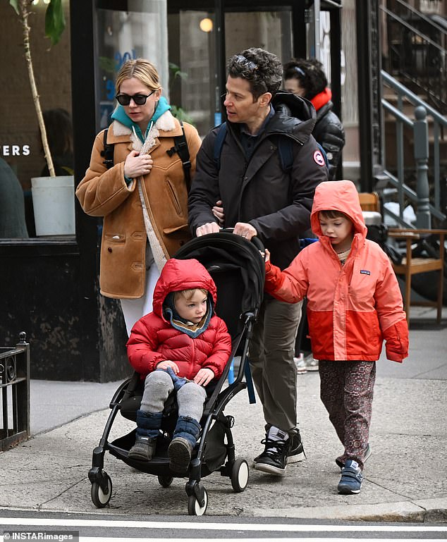 Michelle Williams makes rare public outing with husband and kids