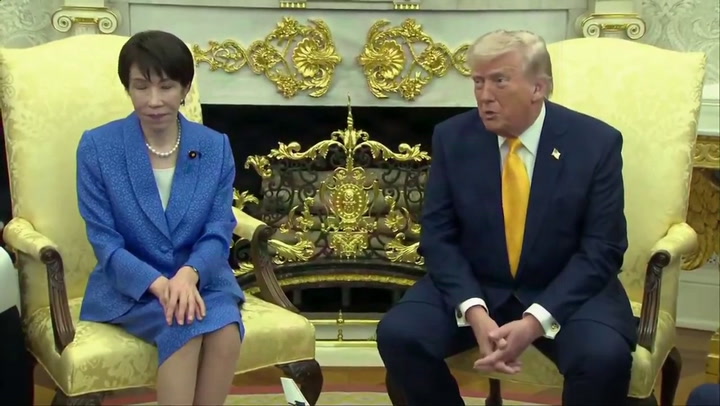Japanese leader sits awkwardly as Trump makes Pearl Harbor joke