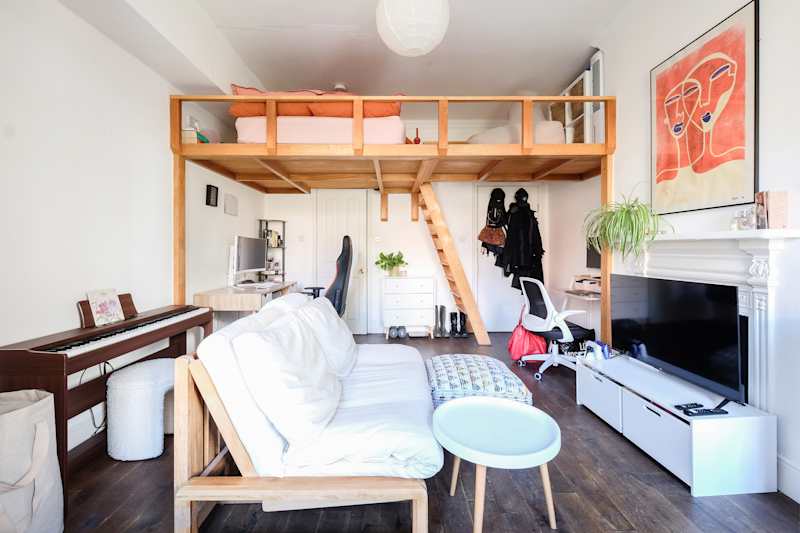 This couple's 250-square-foot studio somehow fits two desks, a dining ...