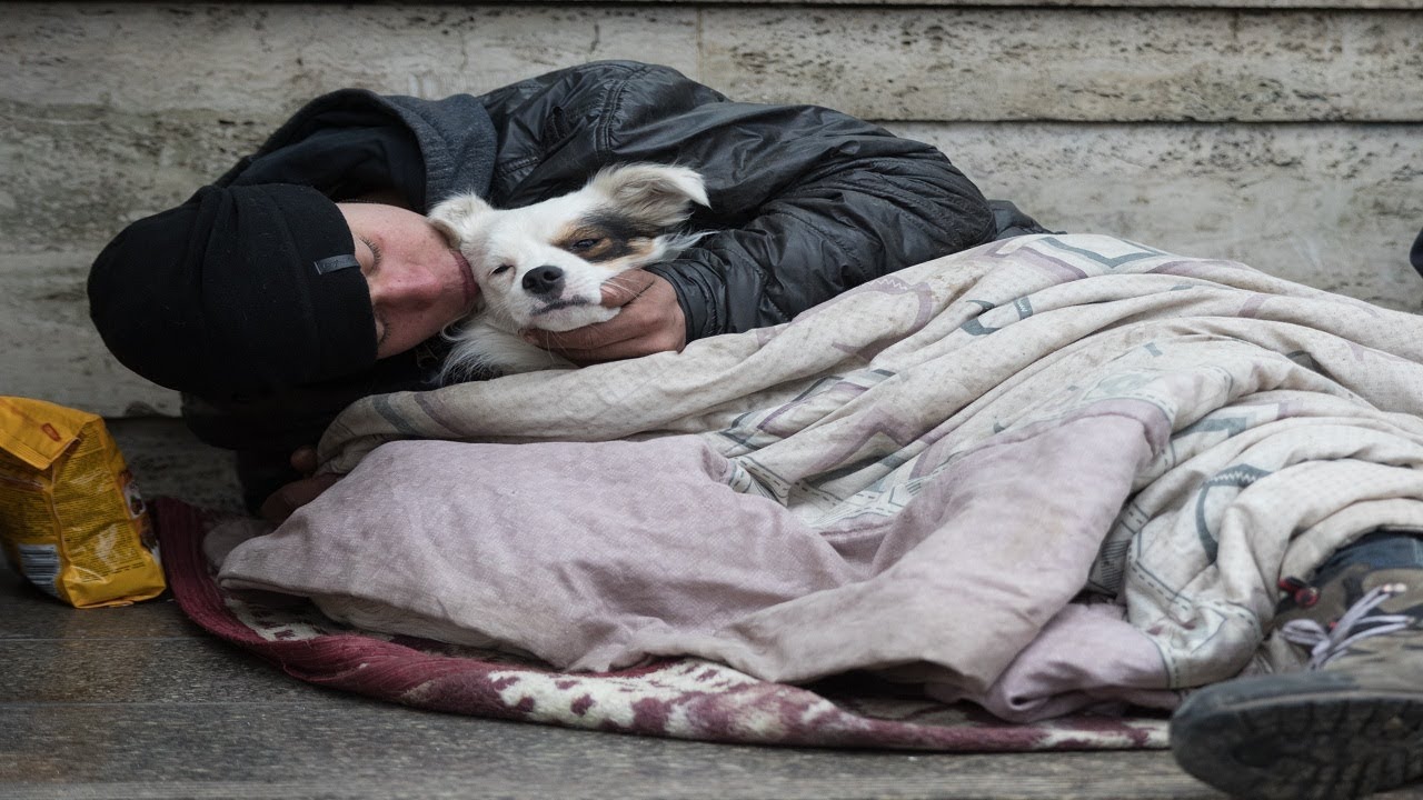 A rescuer found this man asleep on the sidewalk and realized he was ...