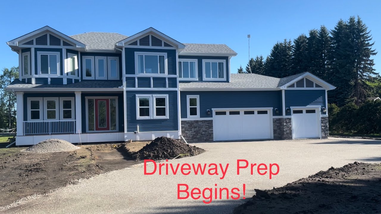 Garage build progress cabinets installed and driveway taking shape