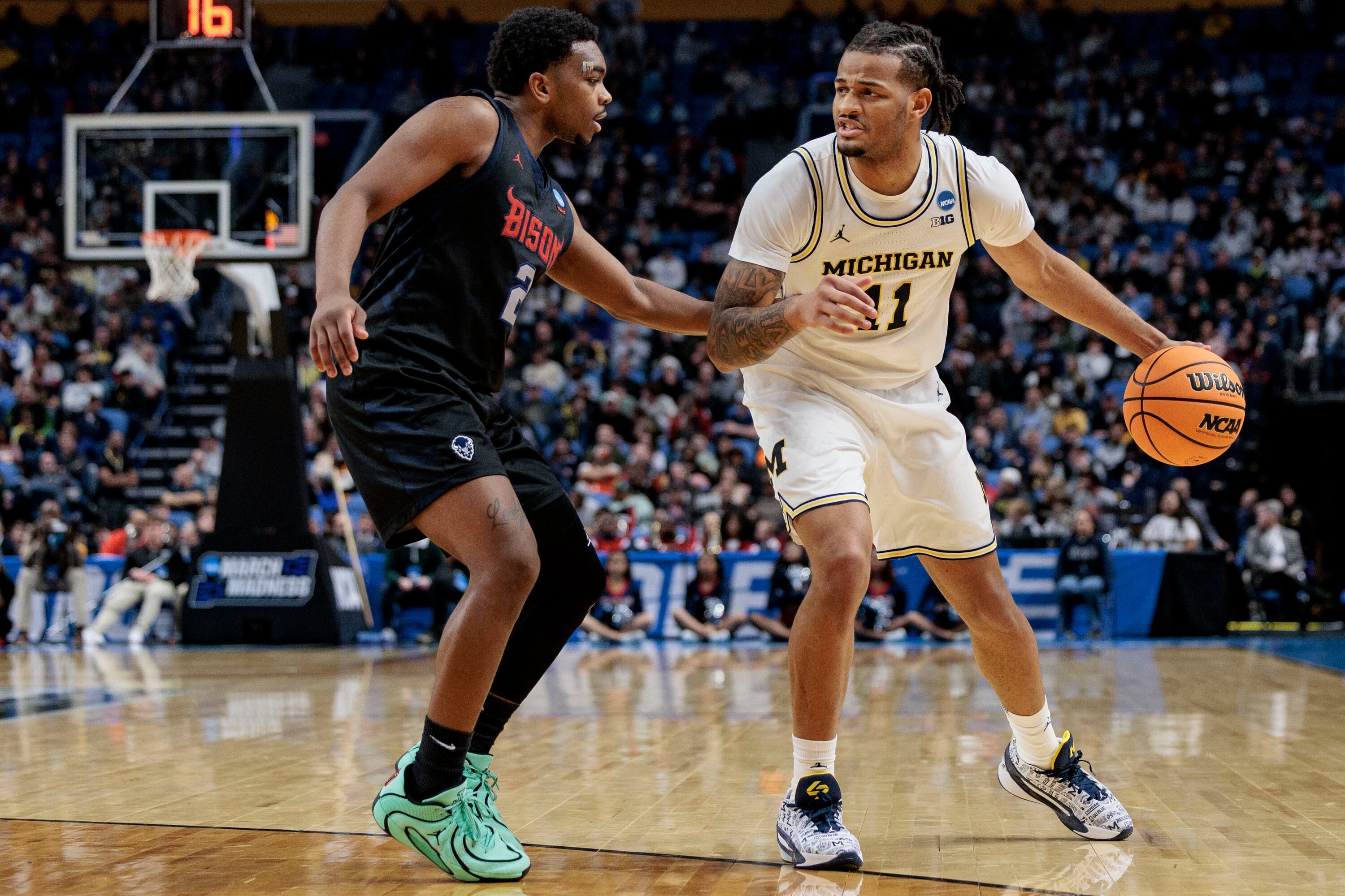 Photos: Michigan cracks 100 points, beats Howard to start tournament