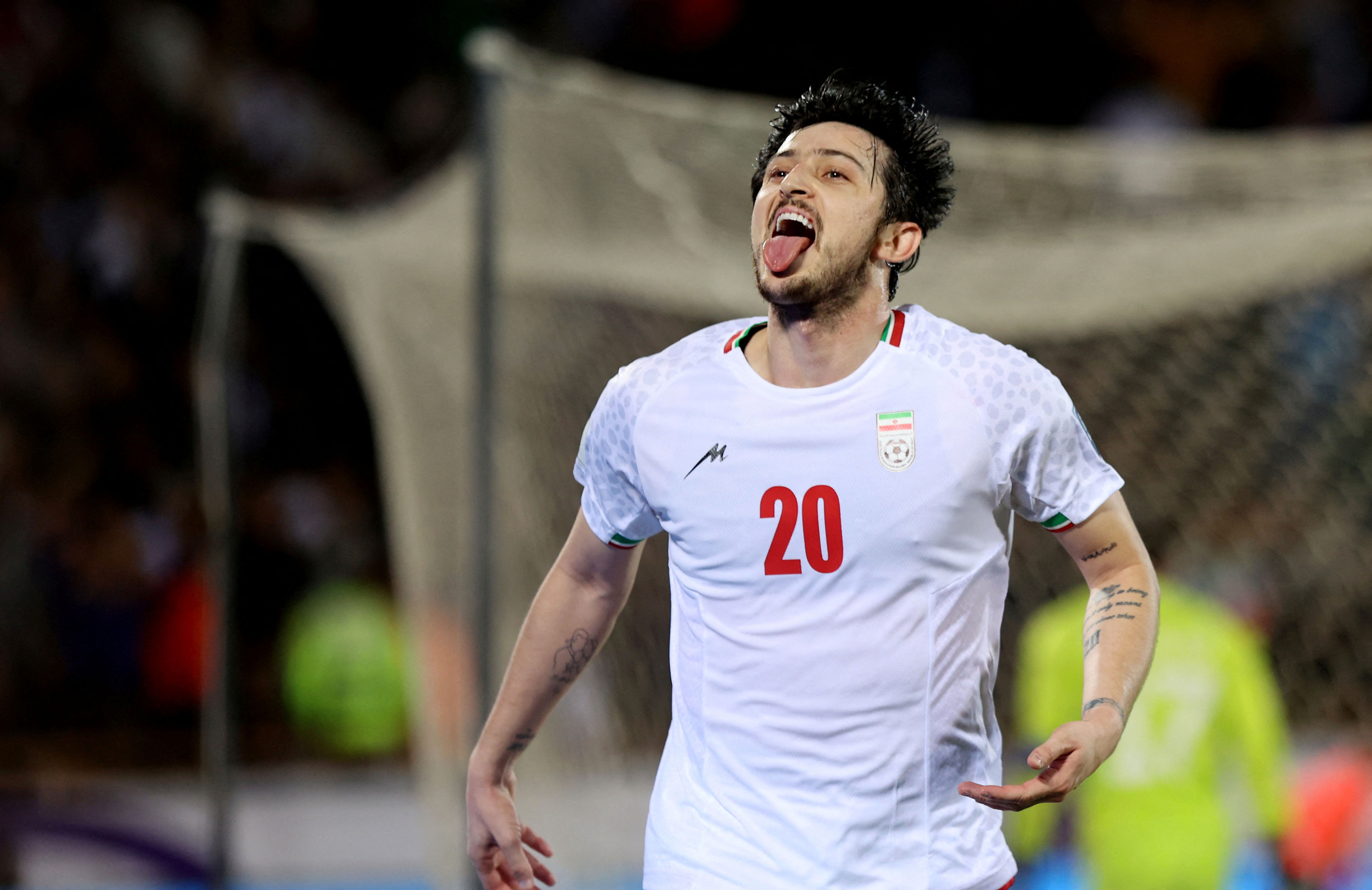 Iran footballer Azmoun kicked off national team for disloyalty, say reports