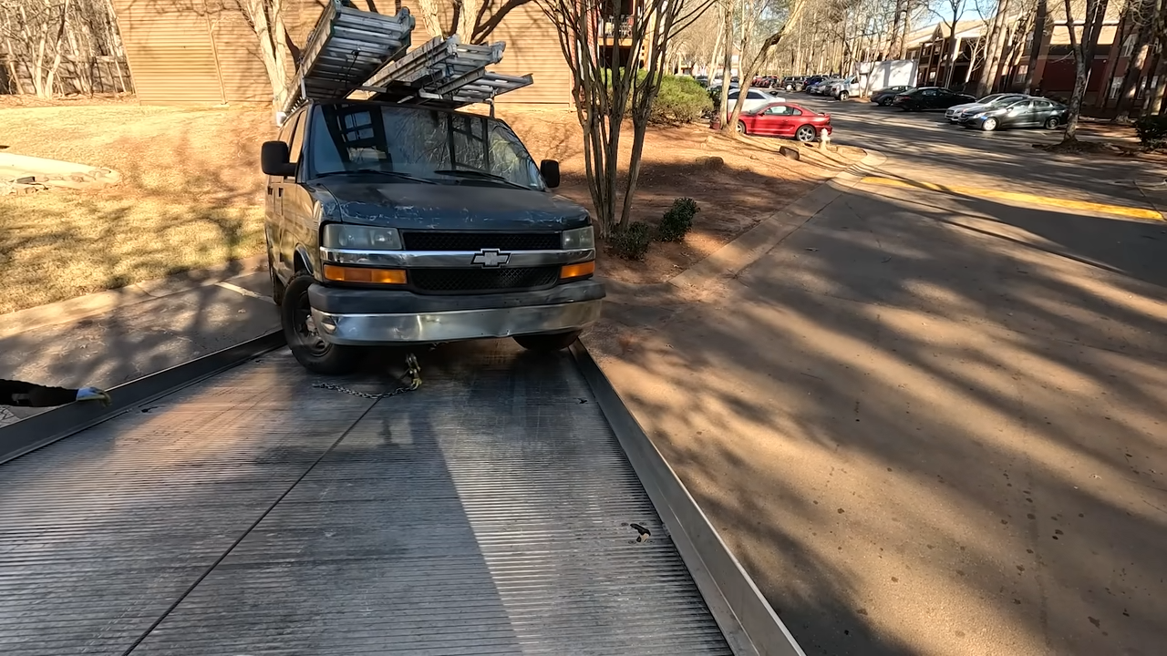 Car with bullet holes towed... what happened here?