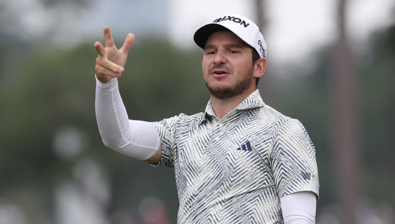 Pro golfer turns customized caddie bib into personal ad at Valspar ...
