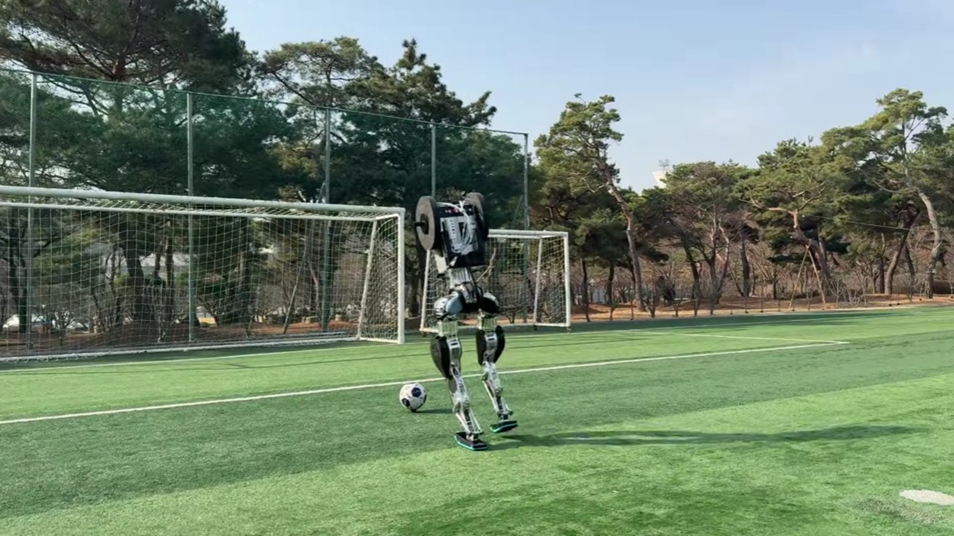 Video: South Korea’s KAIST humanoid robot dances and shoots goals in ...