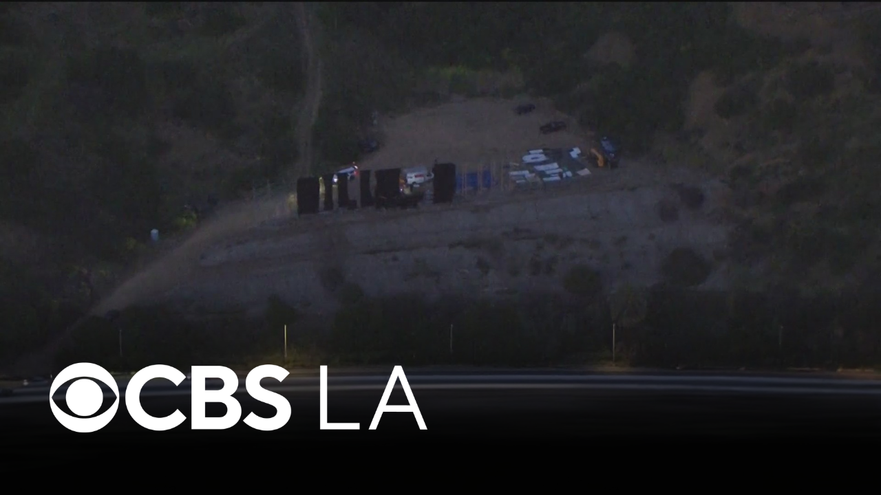 Mysterious sign draws attention along 101 Freeway in Hollywood Hills