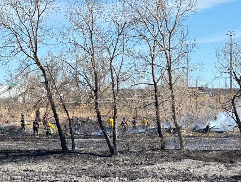 Fire crews extinguish large grass fire in Commerce City