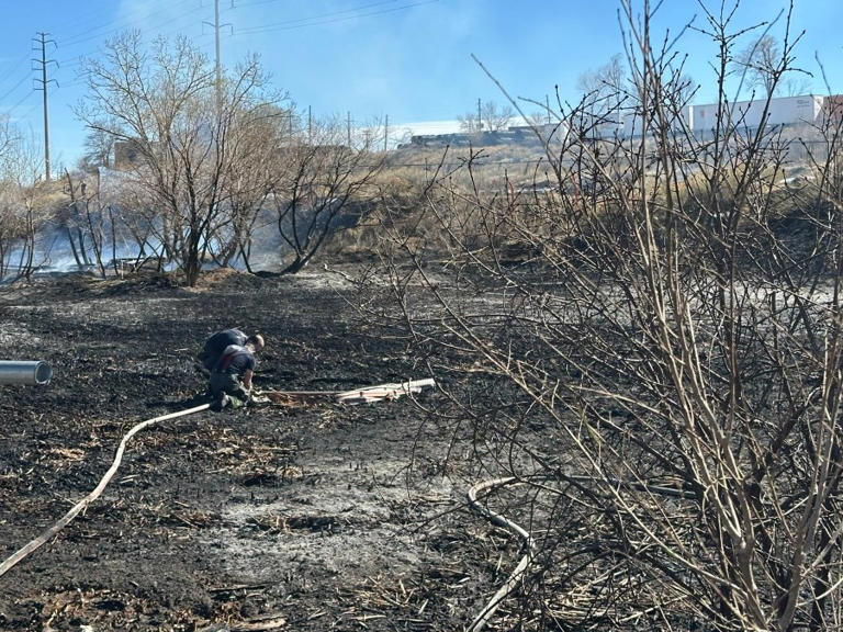 Fire crews extinguish large grass fire in Commerce City