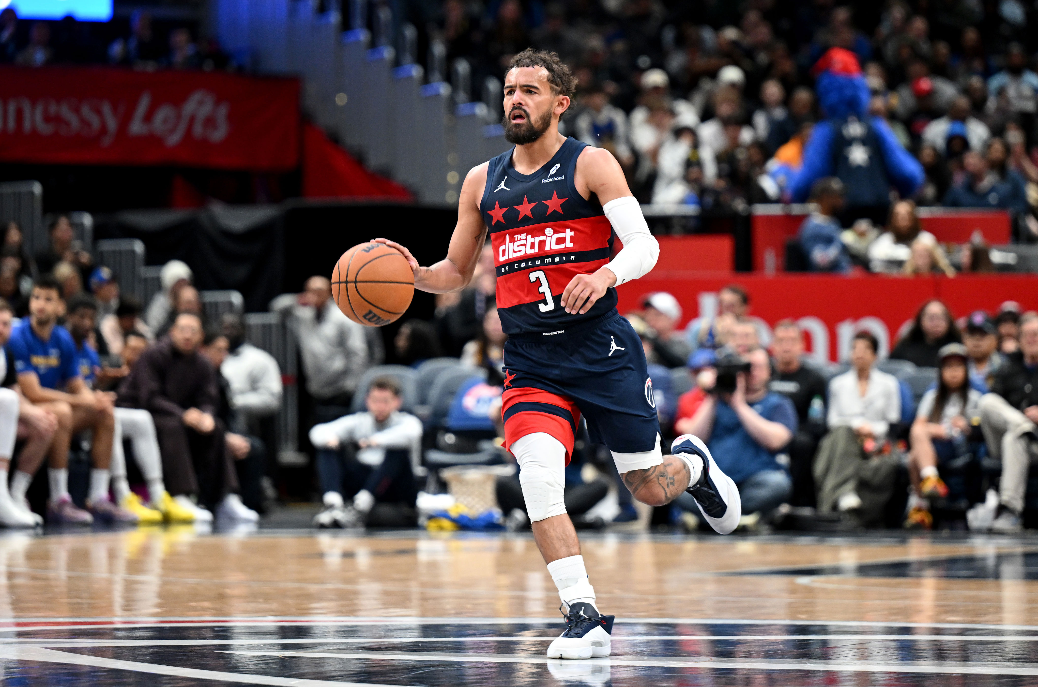 Trae Young out indefinitely with quad, back injuries but won't need ...