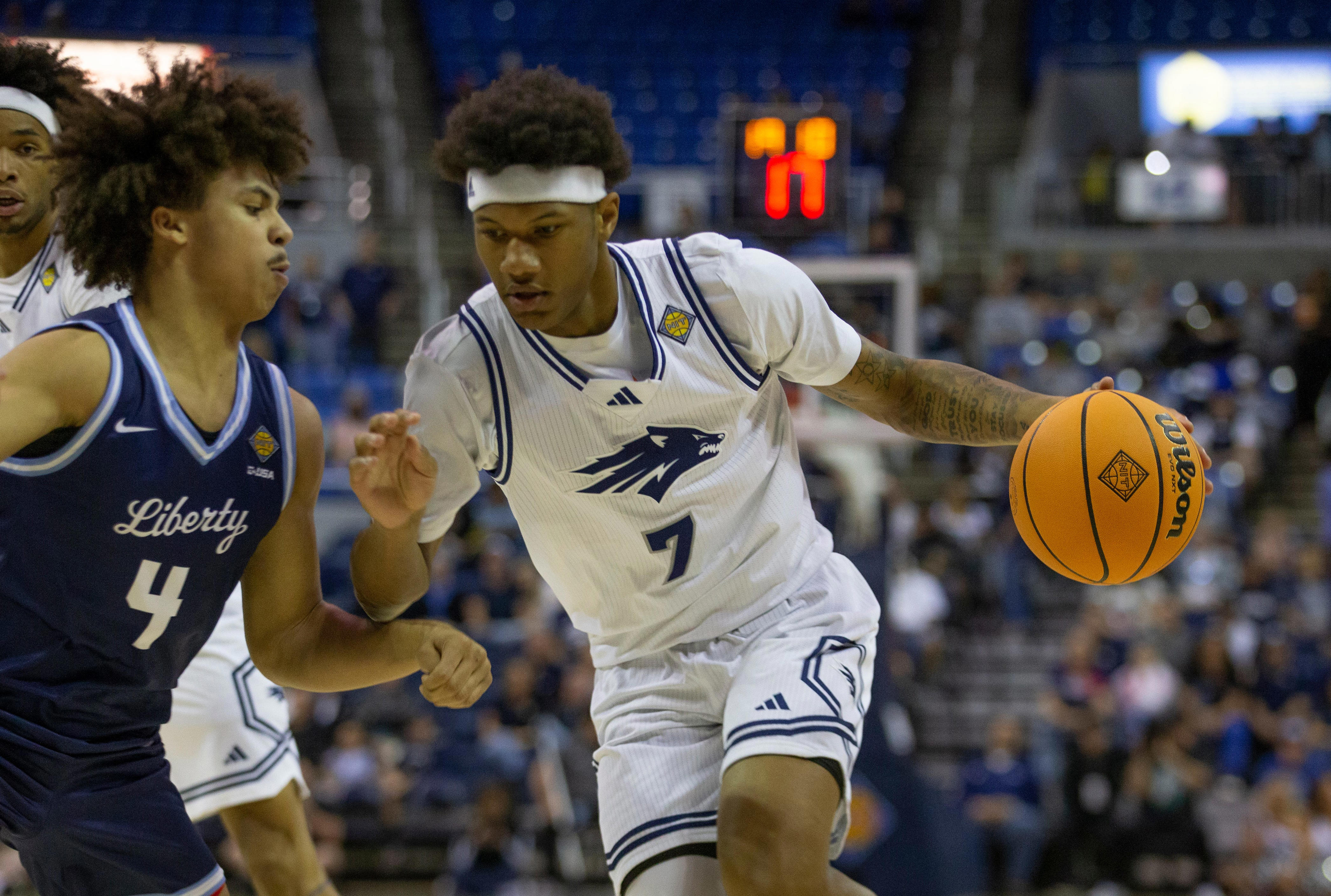 Furious rally lifts Nevada past Liberty 73-63 in NIT second round